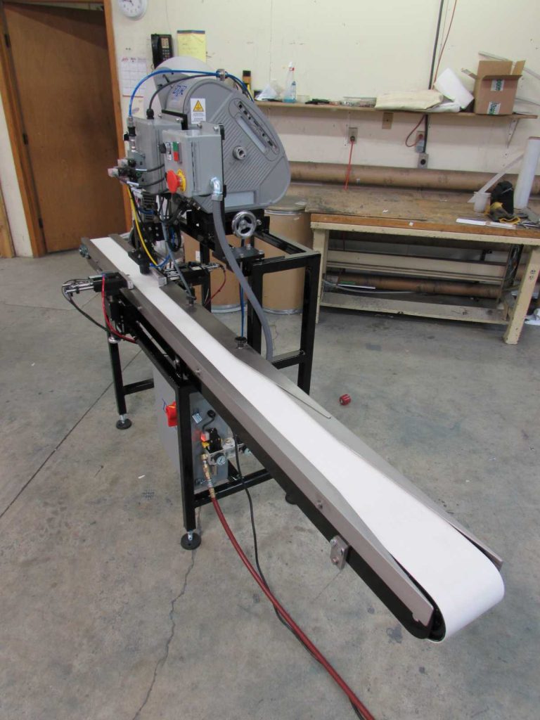 Pellet Box Labeler and Conveyor - D & R Packaging, Inc