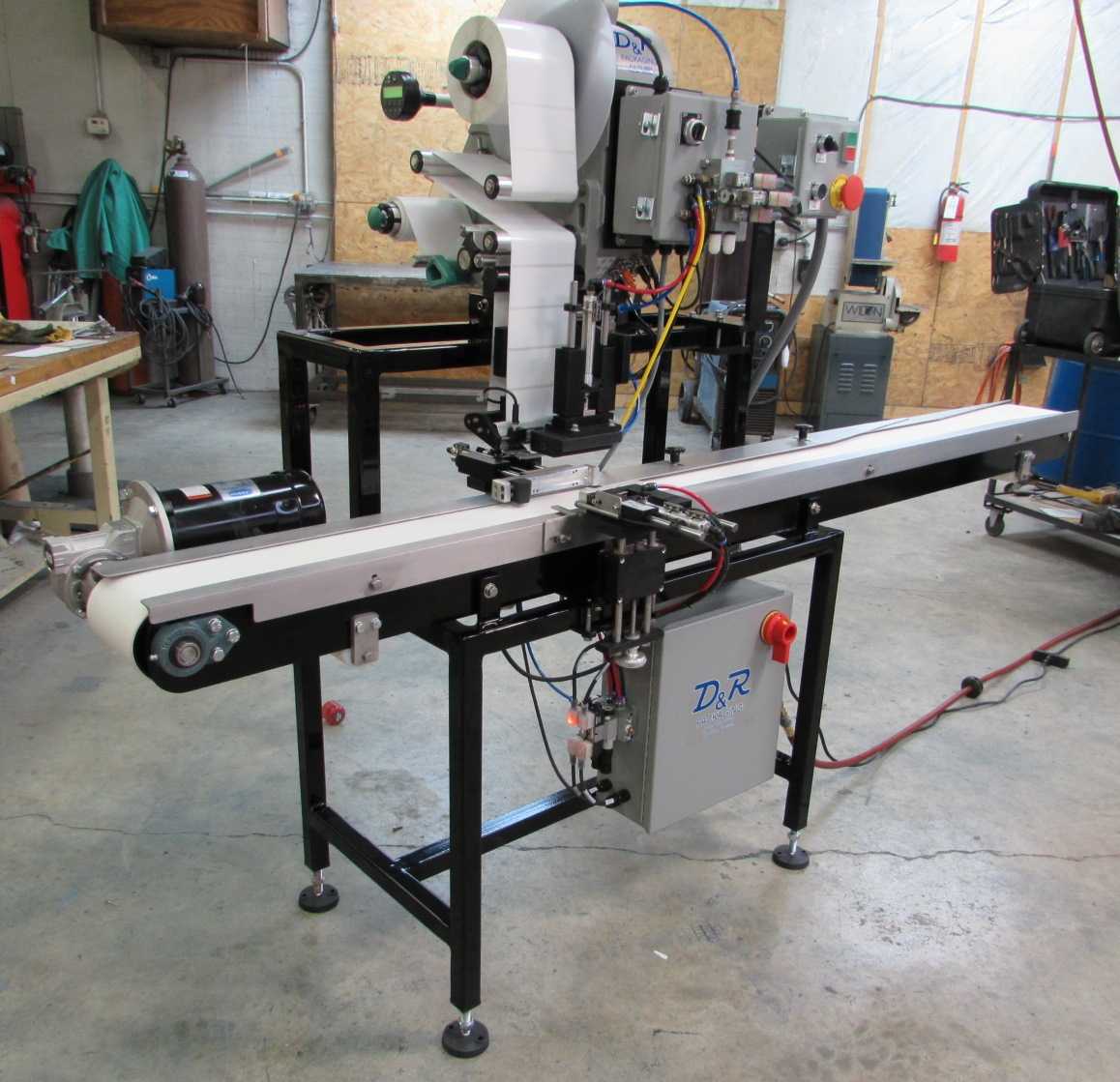 Pellet Box Labeler and Conveyor - D & R Packaging, Inc